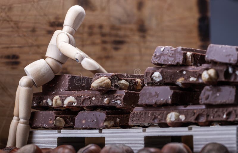 Milk Chocolate with Whole Hazelnuts Placed on a Pallet Stock Photo ...