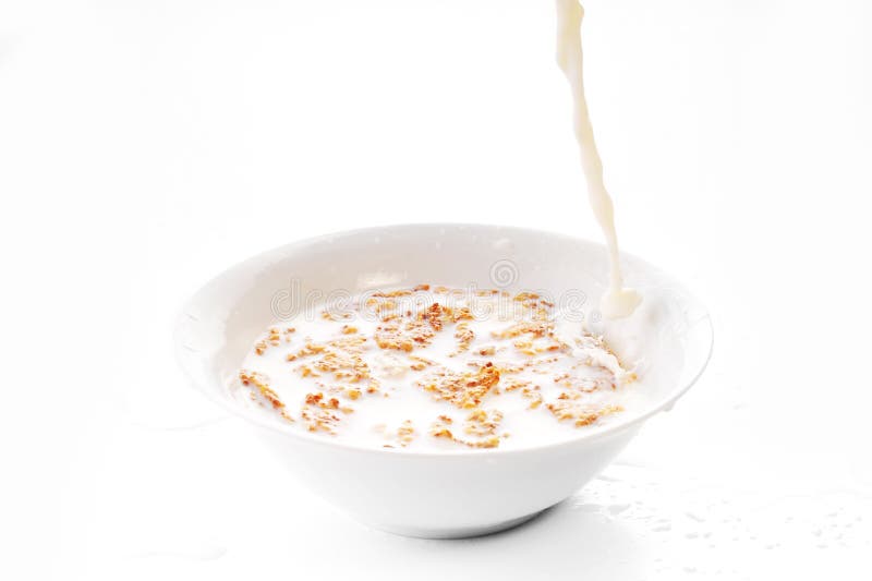 Milk and corn-flakes stock photo. Image of bowl, eating - 11857784