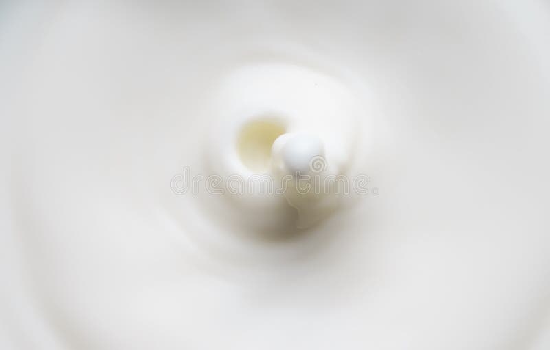 Milk or cream drop falls stock image. Image of droplet - 206756383