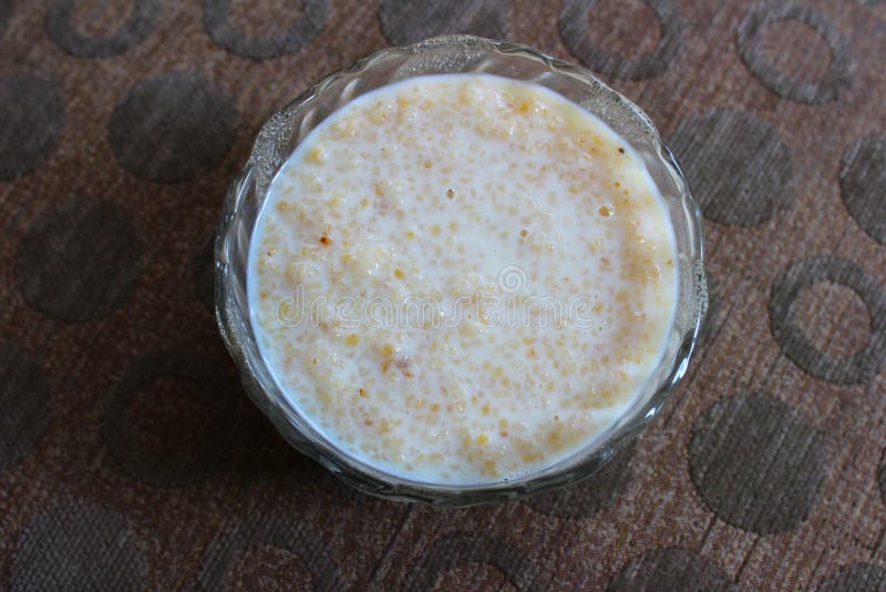 Milk dalia in a glass bowl stock image. Image of cooked - 110548731