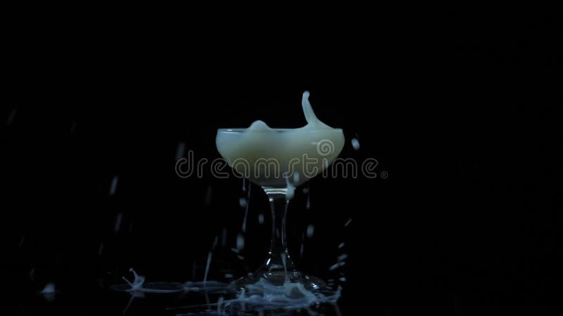 Milk Drink Splash into the Glass with Black Background Stock Footage ...