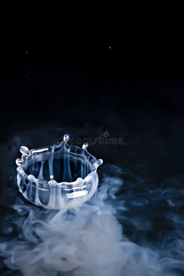 Milk Drop in Water stock image. Image of black, science - 22955491