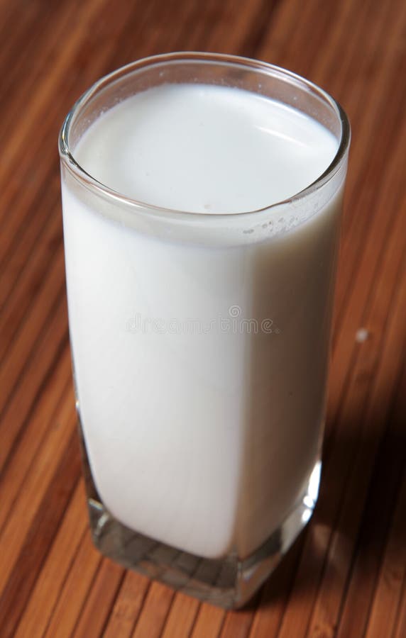 Glass of milk on white stock image. Image of drink, full - 5121141