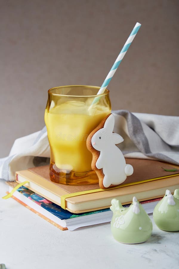 Milk Glass, Decorated Easter Rabbit Cookie on the Books. Springtime ...