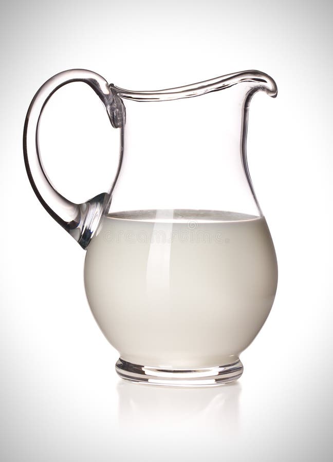 Milk in a glass pitcher stock image. Image of protein - 27178267