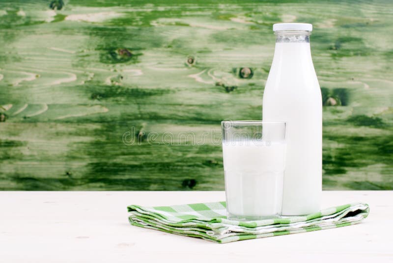 Milk in a Glass on the Table Side View Stock Image - Image of full ...