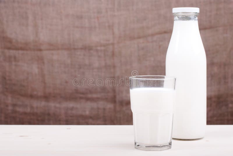Milk in a Glass on the Table Side View Stock Image - Image of nutrition ...
