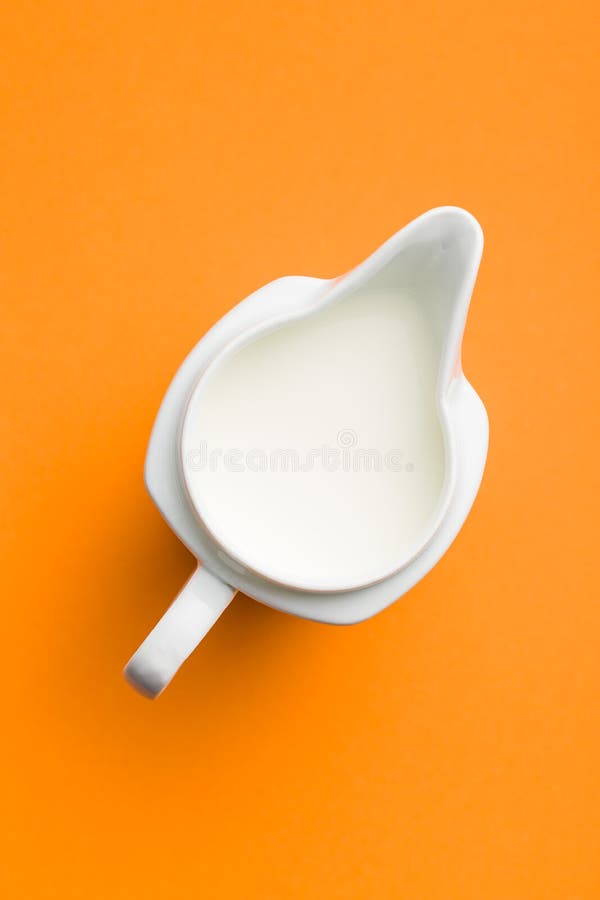 Milk in pitcher stock image. Image of milk, beverage - 14753627