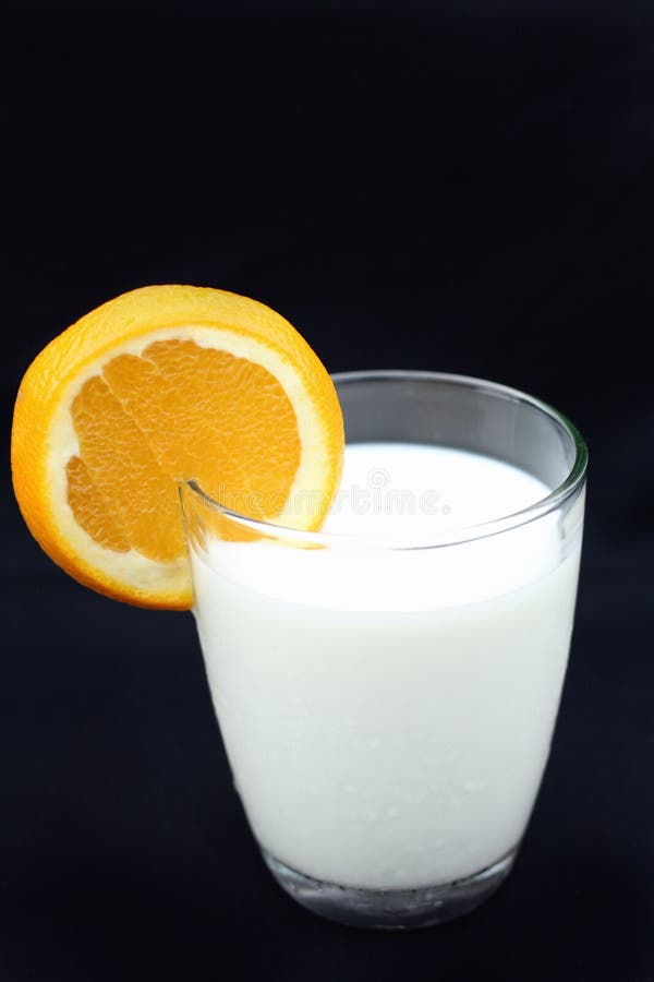 Milk with orange fruit stock photo. Image of drop, fruit - 35354538