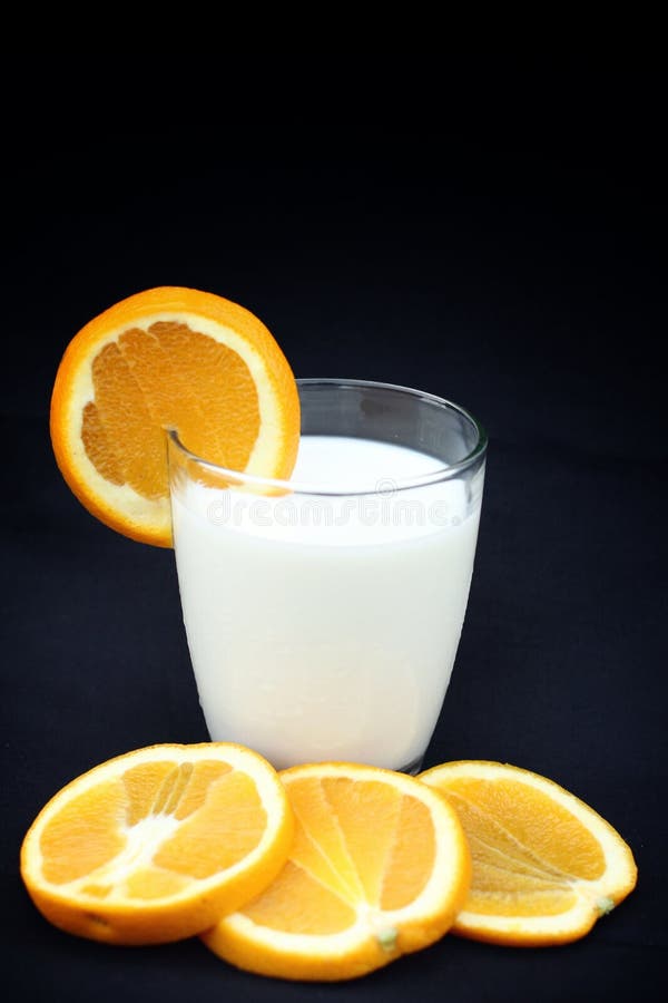 Milk with orange fruit stock image. Image of cream, eating - 35354569