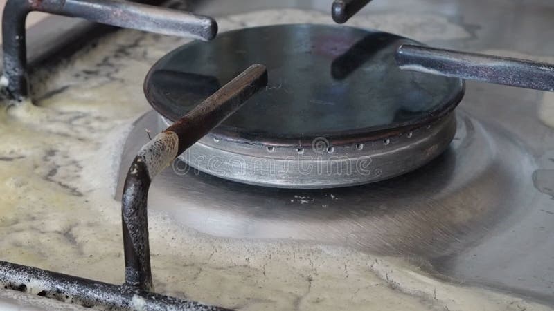 Milk on the Stove Began To Boil and Overflow, a Woman Prevents Milk ...