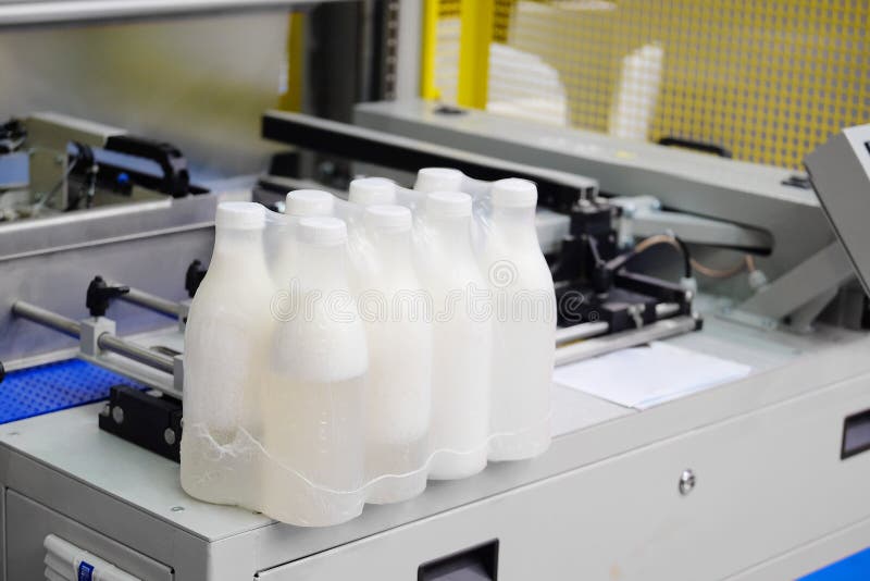 Milk packing machine stock photo. Image of produce, productivity - 68858902