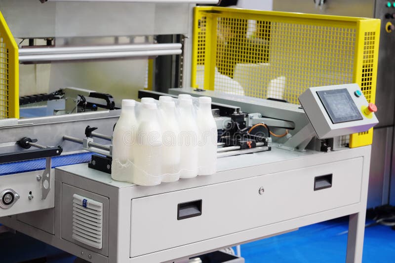 Milk packing machine stock photo. Image of mill, equipment - 68858916