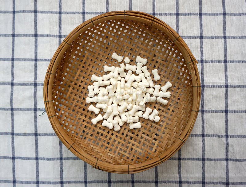 Milk pellets in bone shape stock image. Image of food - 61785309