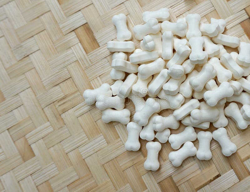 Milk pellets in bone shape stock image. Image of food - 61830161