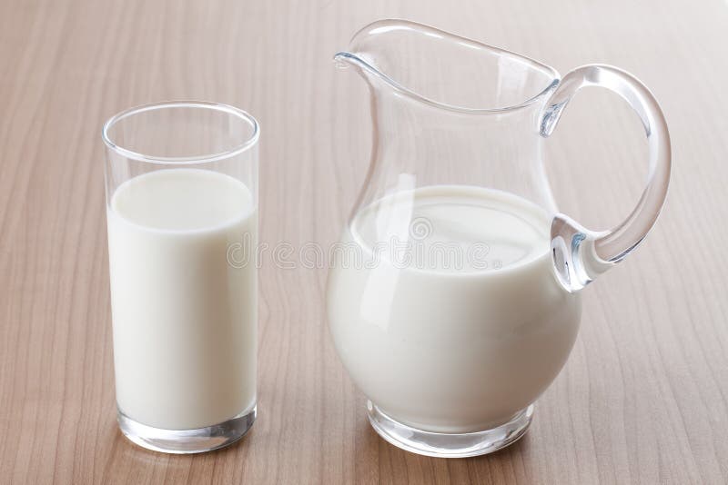 Milk in pitcher stock image. Image of milk, beverage - 14753627
