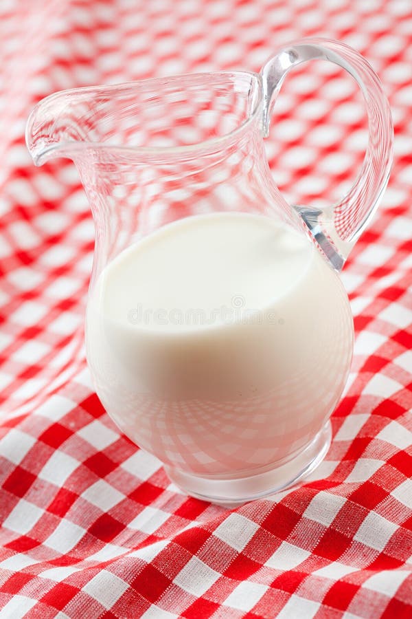 Milk in pitcher stock image. Image of calcium, cold, handle - 14753679
