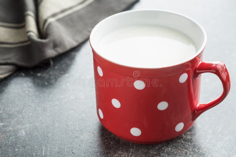 Milk in Red Mug with White Spots. Stock Image - Image of color ...