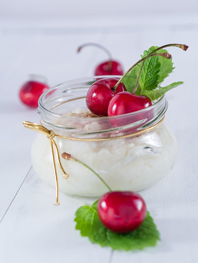 Milk rice with cherries stock image. Image of products - 41470709