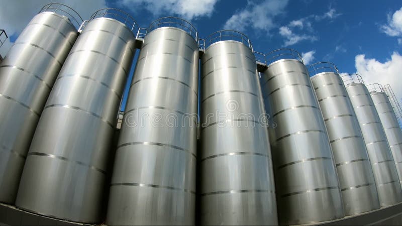 Milk Storage Tank at a Dairy Plant.. Tankers with Milk in the Unloading ...