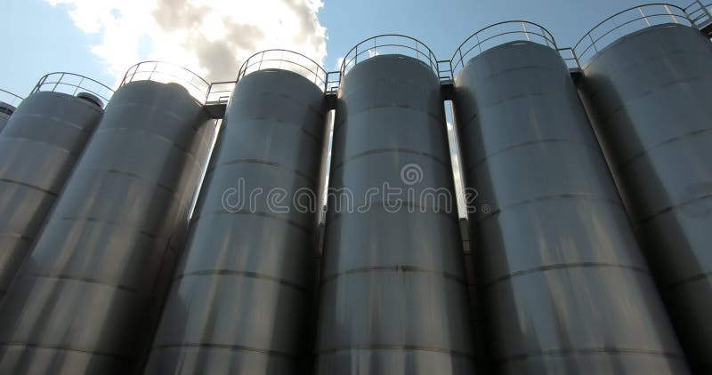 A Milk Storage Tank at a Dairy Plant. Milk Tanks in the Unloading Area ...