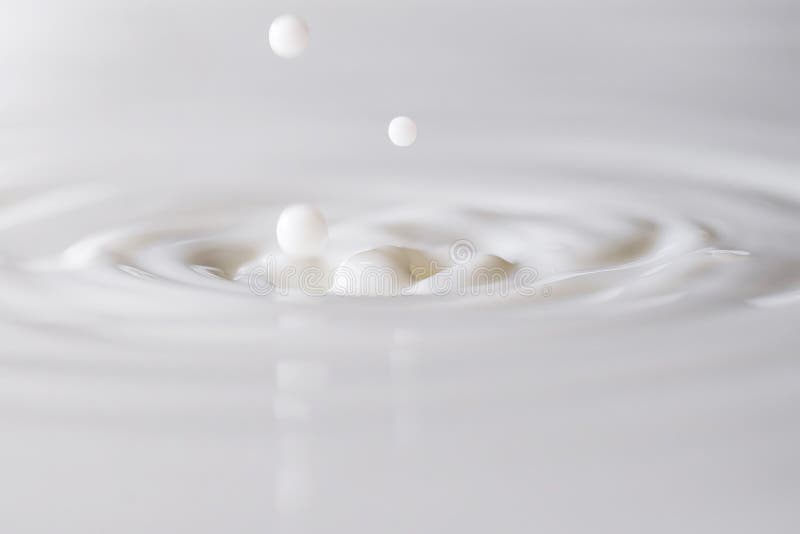 Milk White Liquid Splashing and Making Droplets Stock Image - Image of ...