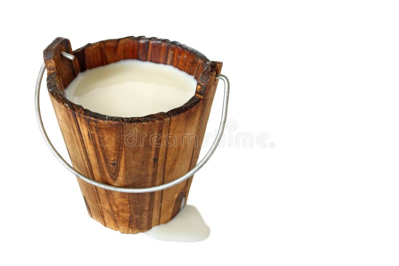 Milk in wooden bucket stock image. Image of dairy, health - 19931053