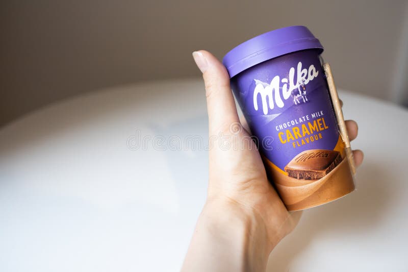 Milka Chocolate Milk with Caramel Flavour in Hand Editorial Stock Image ...