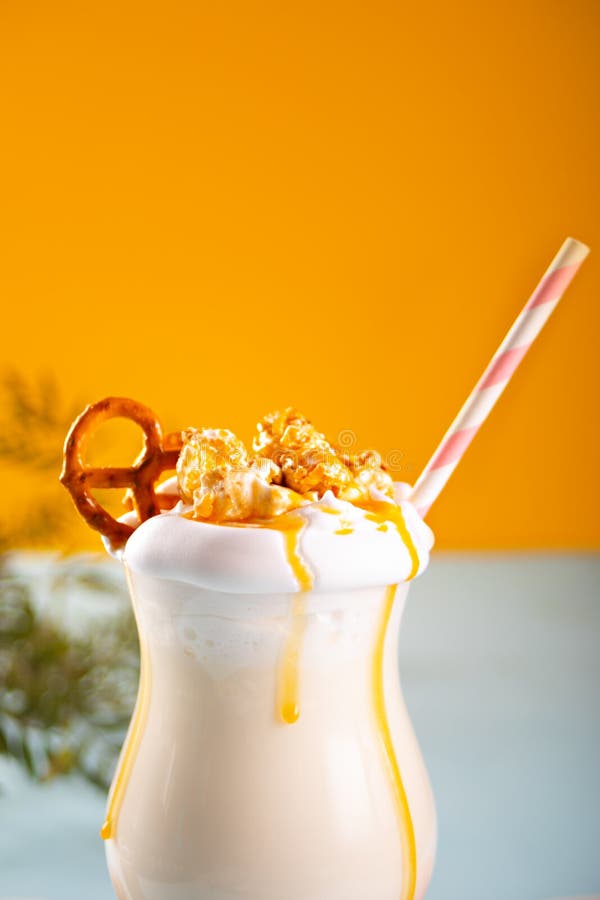 Milkshake with Caramel Syrup, Popcorn and Brezel Waffles Stock Image ...
