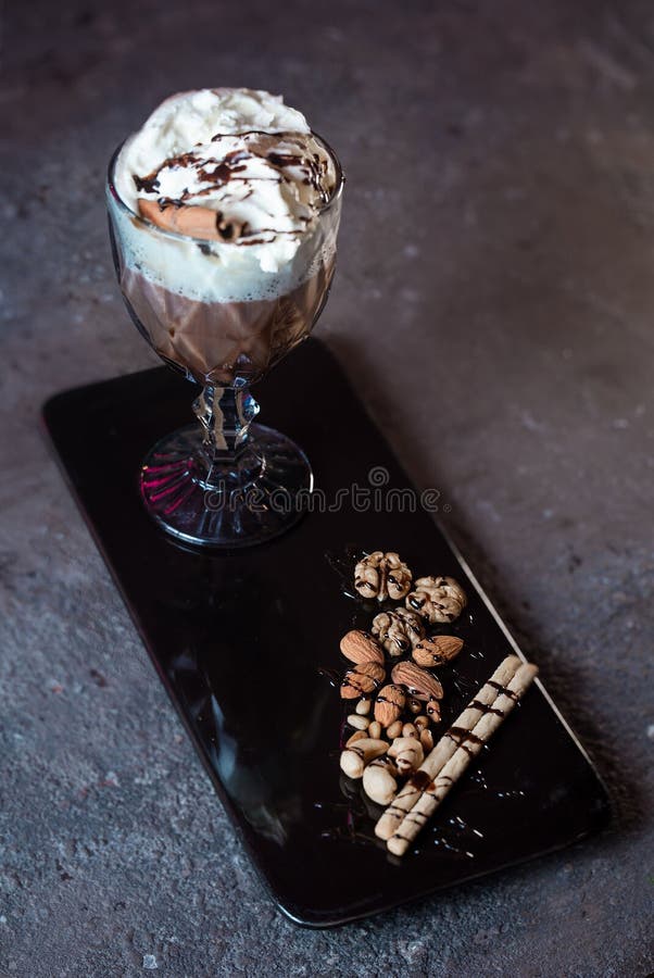 Milkshake with Cinnamon in a Glass in a Cafe Stock Image - Image of ...