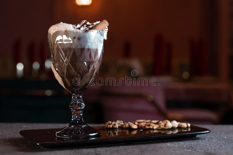 Milkshake with Cinnamon in a Glass in a Cafe Stock Image - Image of ...