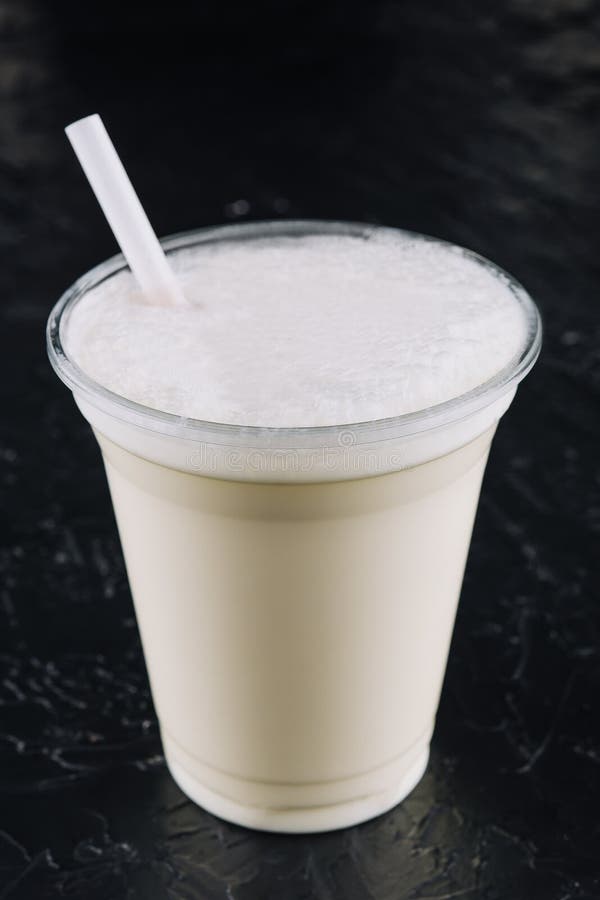 Milkshake in a Plastic Cup on Black Stock Photo - Image of life, juice ...
