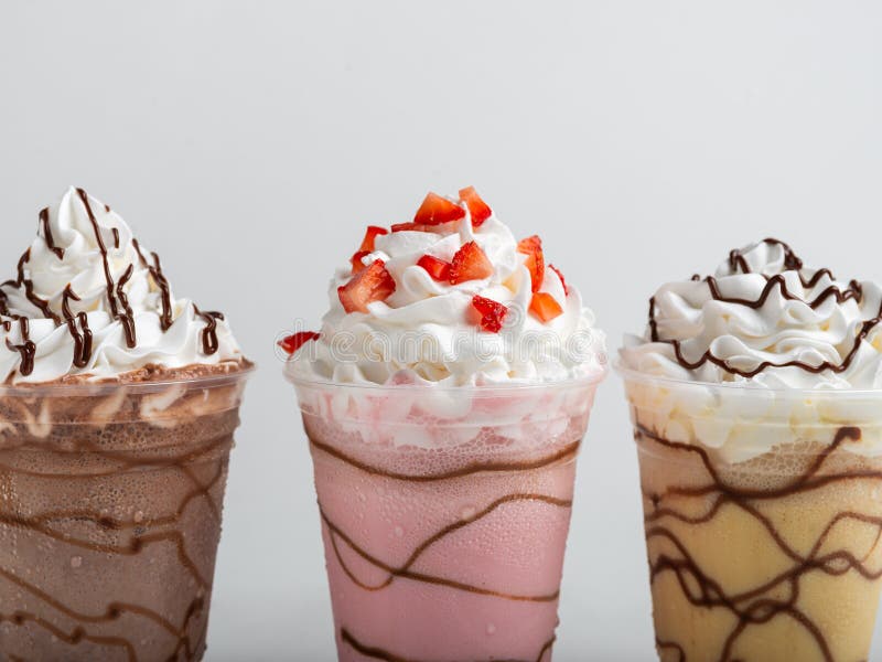 Milkshakes of Different Flavors on a White Background Stock Photo ...
