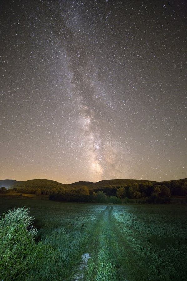 Milky way and green way stock image. Image of hilly, galaxy - 60317377