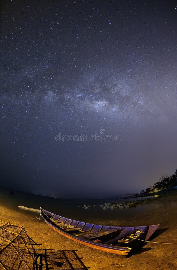 Beautiful Milkyway and Fishing Boat Stock Photo - Image of orange ...