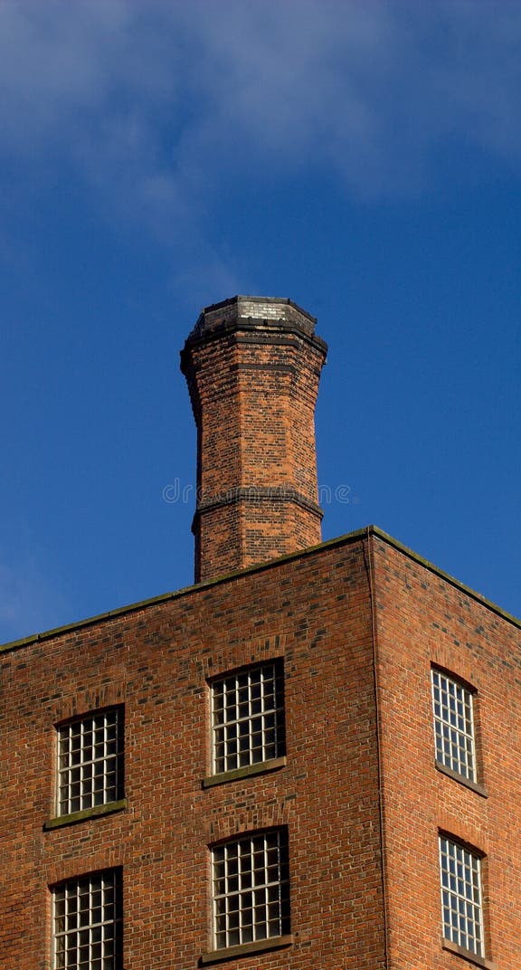 Mill chimney in Manchester stock image. Image of revolution - 178826427