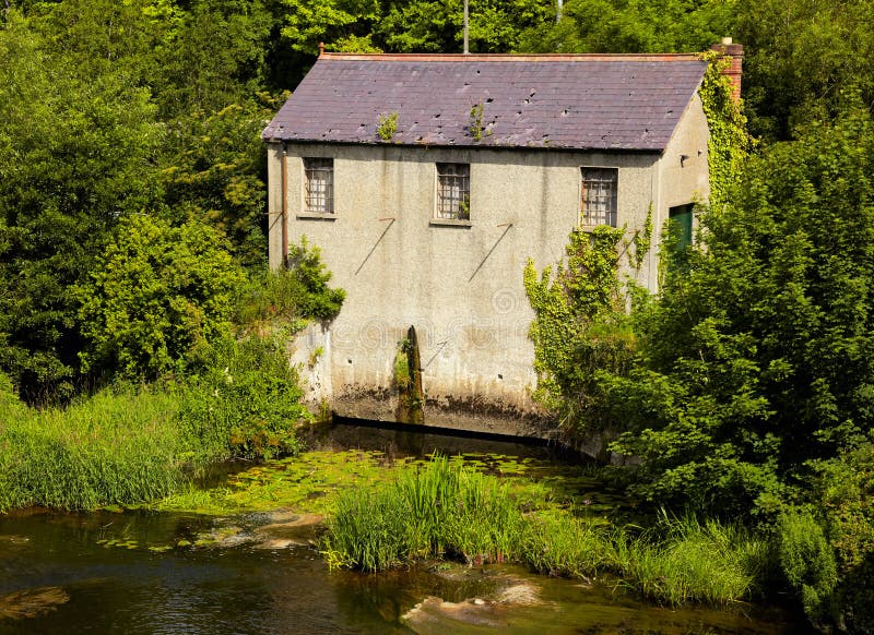 Mill on Liffey river stock image. Image of environment - 23990477