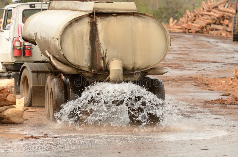 Mill Ops stock photo. Image of dust, tank, wetting, yard - 32021952