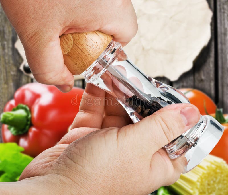 Mill for Spices in the Hands Stock Photo - Image of ingredient, lettuce ...
