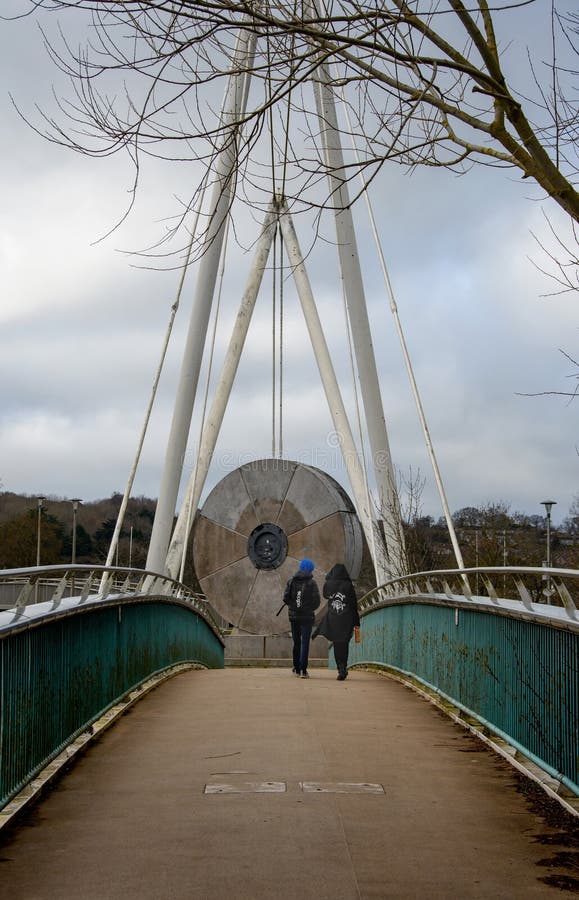 Mill Stone Hangs Over the Bridge at Exeter. Editorial Photography ...