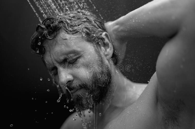 Millennial Man Washing Hair In Bath Guy Bathing Shower Head In Bathtub