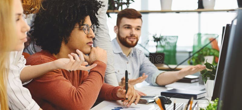 Millennial Team Working with New Project on Computer Screen Stock Image ...