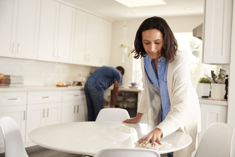 Woman Cleaning Surface in Kitchen Stock Photo - Image of wiping ...