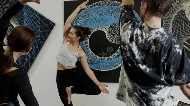 Millennials Practicing Healthy Active Lifestyle in Modern Loft Studio ...