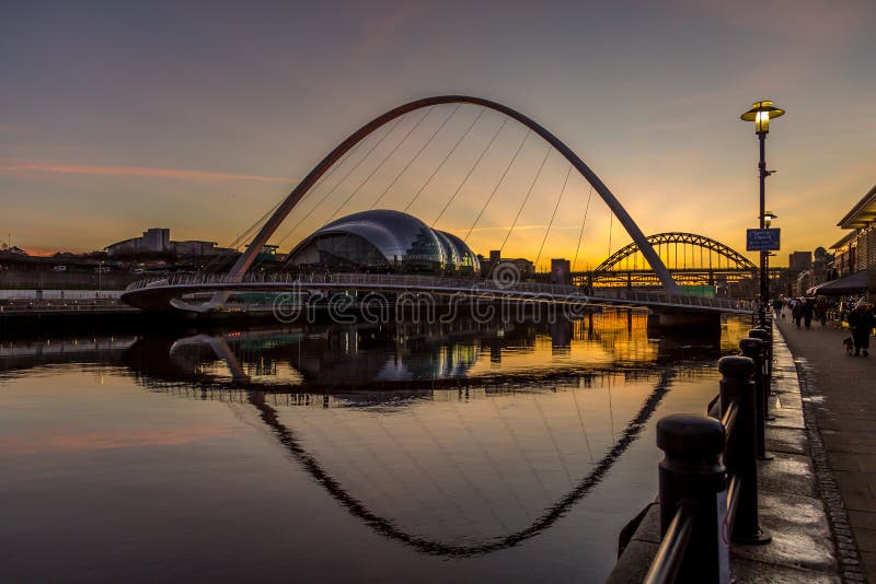 The Millennium Bridge in Newcastle at Sunset, Reflecting in the almost ...