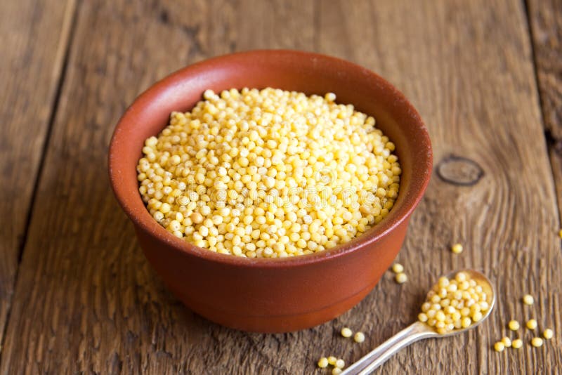 Millet in bowl stock image. Image of ingredient, organic - 59349273