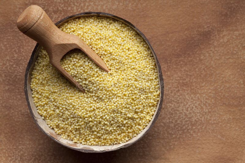 Millet in a Bowl on Paper Background Stock Photo - Image of groats ...