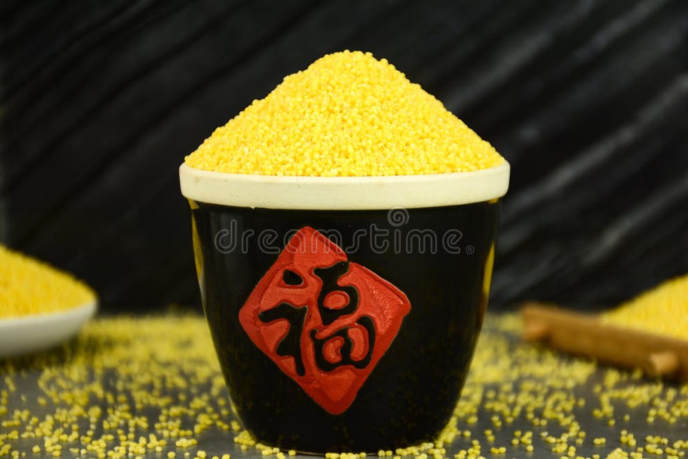 Millet with Cup, White Dish, on the Table Stock Photo - Image of yellow ...