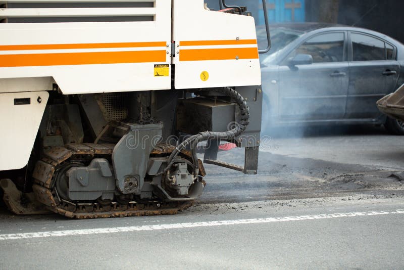 Milling of Asphalt for Road Reconstruction. Stock Photo - Image of ...