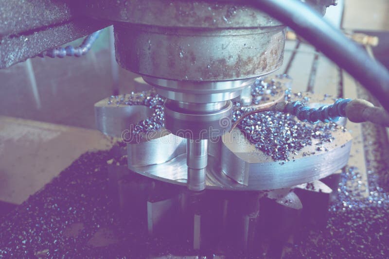 The Milling Cutter on the CNC Machine Processes the Gear Tooth Stock ...
